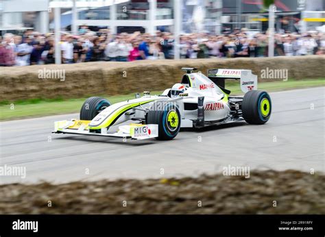 Brawn Bgp 001 Formula 1 Grand Prix Racing Car Driving Up The Hill