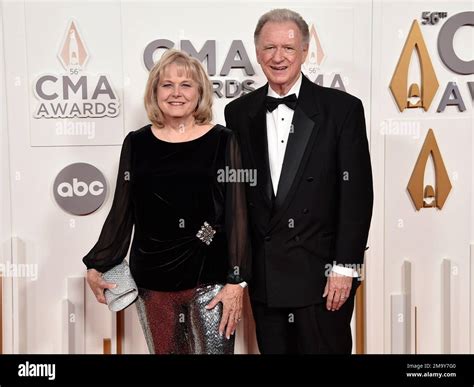 Emy Joe Bilbrey Left And Keith Bilbrey Arrive At The 56th Annual Cma