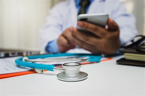 Premium Photo Medic Working With Modern Smart Phone