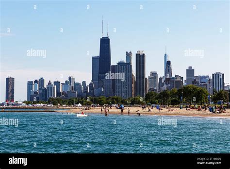 Lake Michigan Beach With Chicago City Skyline In The Background