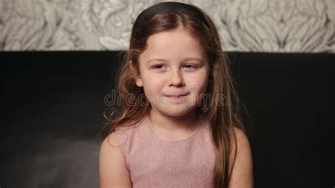 Adorable Young Happy Girl Looking Straight Ahead Close Up Portrait