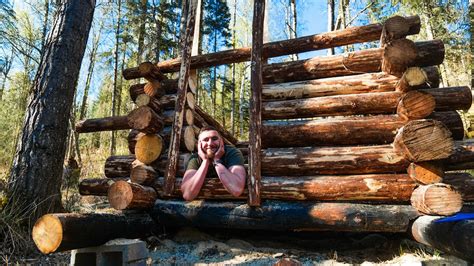 Building A Log Cabin Walls Notching Logs Cutting Door Youtube