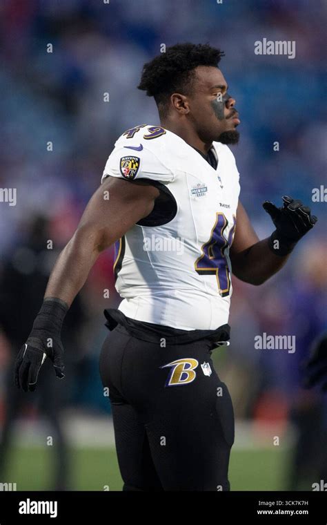 Baltimore Ravens Linebacker Jay Higgins Iv 49 Warms Up Before An Nfl