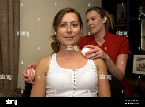 Young Woman Receiving A Lava Shell Massage At A Spring Lifestyle Event
