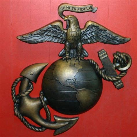 Eagle On Globe With Anchors And Hook