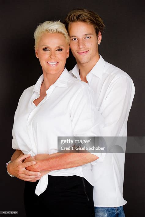 Brigitte Nielsen And Her Son Douglas Aaron Meyer Pose During A News Photo Getty Images