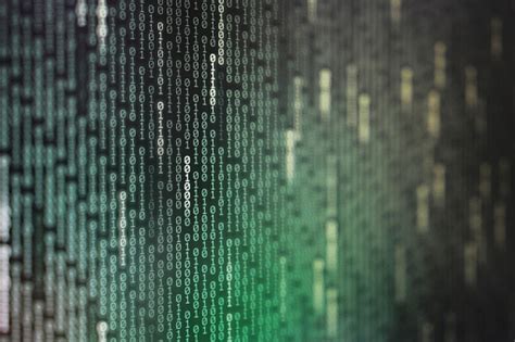 Power Of Big Data Binary Code Information Bit On Computer Monitor Screen Display Green Light