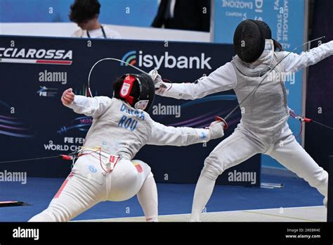 Sera Azuma Of Japan R Fights Against Dinca Andreea Of Romania During The 2023 Fie Fencing