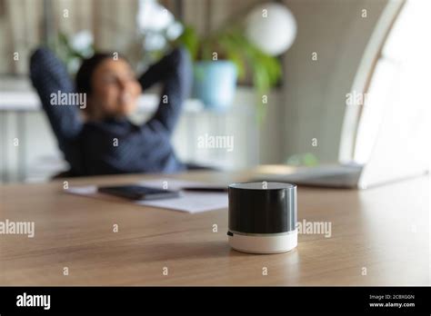 Close Up Focus On Portable Little Digital Assistant On Table Stock