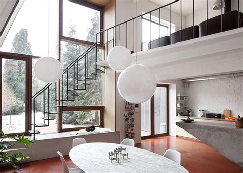 Assorted Windows And Diagonal Cladding Feature On Renovated Home