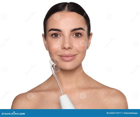 Woman Using High Frequency Darsonval Device On White Background Stock