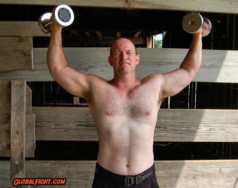 Muscle Bearcub Lifting Weights In Farm Barn R Hairybearmuscledaddy
