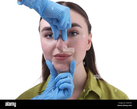 Doctor Checking Patients Nose Before Plastic Surgery Operation On