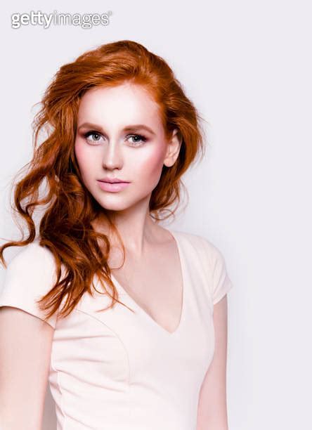 Portrait Of Beautiful Young Redhead Woman With Professional Make Up