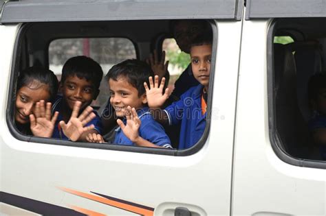 Unidentified Students In Uniform Go Back Home By School Bus After
