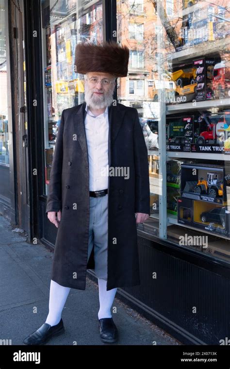 A Posed Portrait Of An Orthodox Jewish Man Dressed For Purim In A
