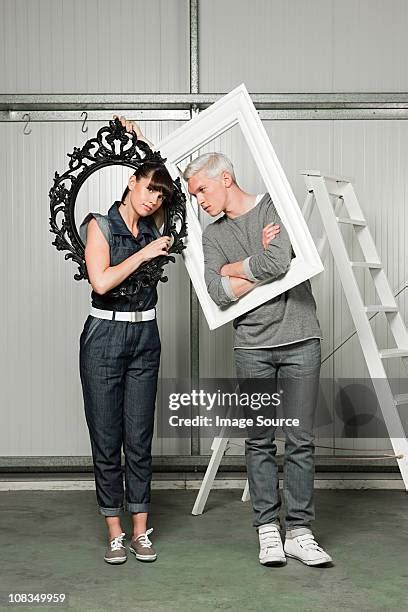 Woman Comparing Two Things Photos And Premium High Res Pictures Getty