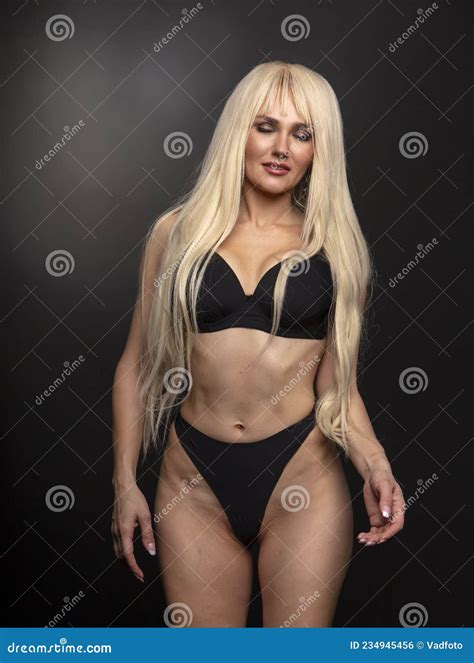 Fashionable Photo Of Young Blonde Woman Wearing Black Lingerie Stock