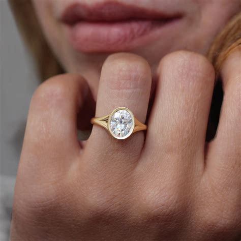 Customizable 9x7mm Oval Moissanite Bezel Set Hidden Halo Unique