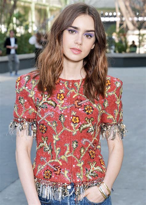 Lily Collins Attends The Chanel Show During Lily Collins Source