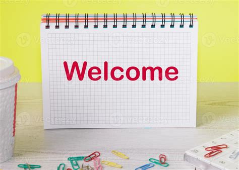 Text Welcome To The Notebook In A Cage On A Yellow Background 75822905