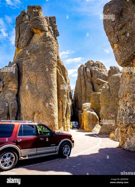 Car In Needles Eye Tunnel On The Needles Highway In Custer State Park