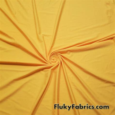 Golden Yellow Matte 4 Way Stretch Nylon Spandex Fabric Fluky Fabrics