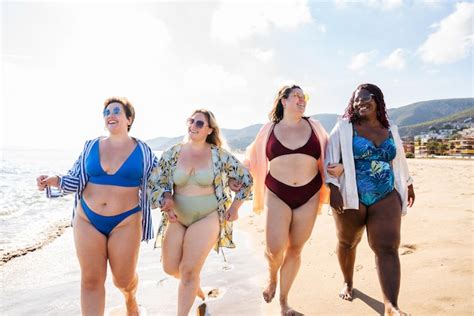 Premium Photo Group Of Plus Size Women With Swimwear At The Beach