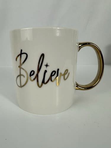 Coffee Mug Believe Gold And Off White Ceramic Christmas 16 Fl Oz New