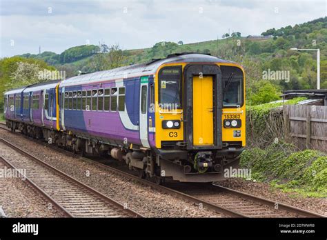 Class 153 Single Coach Sprinter Railcar Passenger Train Coupled To A