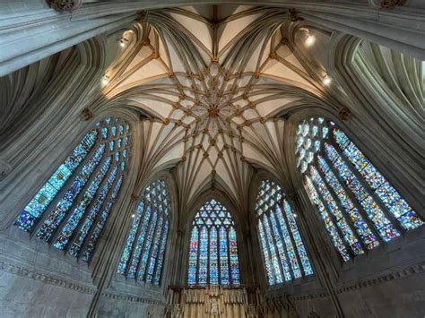 Premium Photo Low Angle View Of Glass Window In Building