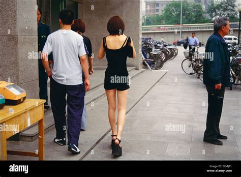 Chinese Girl In High Heel Platform Sandal Boots And Hot Pants China