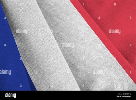 France Flag With Big Folds Waving Close Up Under The Studio Light