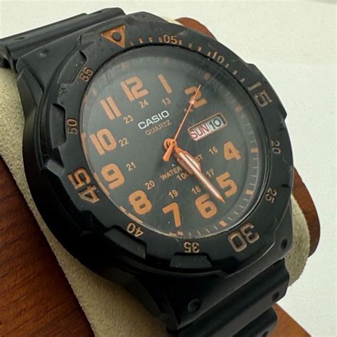 Casio Mrw 200h 4bv Menâ S Quartz Watch 44mm Blackorange Dial Date New