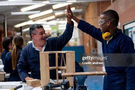 Teacher High Five Students Photos And Premium High Res Pictures Getty