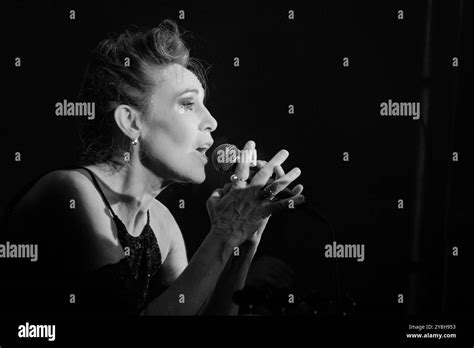 A Close Up Black And White Picture Of Mona Soyoc Lead Singer Of Kas