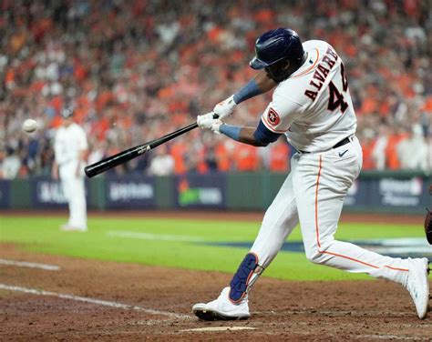 Download Yordan Alvarez Powerful Swing Baseball Action Wallpaper