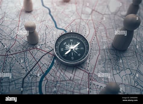 Compass And The Wooden Doll Represents The Employee Of The Company On