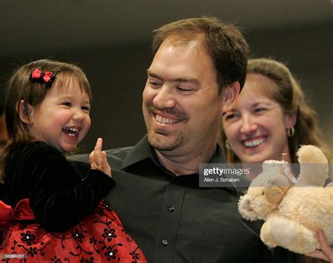 20 Month Old Chelsea Morgan Laughs With Her New Father And Mother