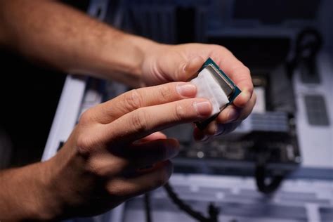 premium photo cropped image of an engineer showing a computer