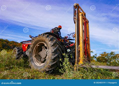 Tractor Forklift In Field Agricultural Machinery And Equipment Stock
