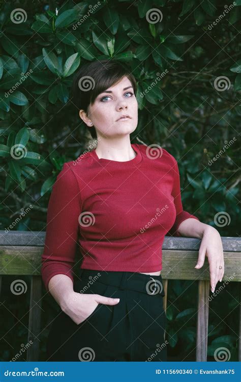 Attractive Cute Female Model With Short Pixie Hair Modeling Outside In