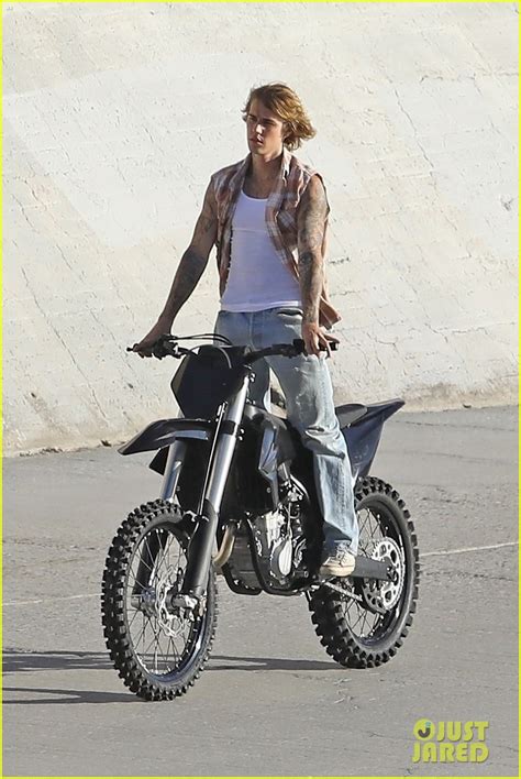 Justin Bieber Rides A Motorcycle While Seemingly Filming A New Music