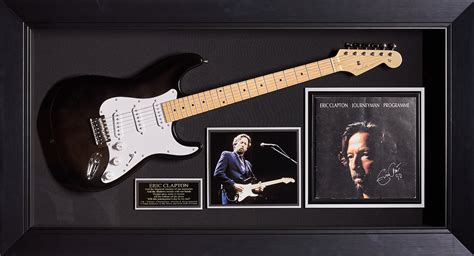 Eric Clapton Signed Album Cover And Replica Guitar Sevyn
