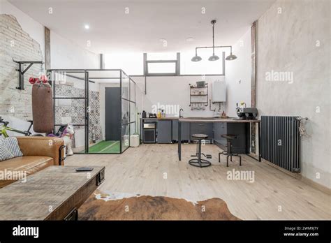 Large Open Plan Living Room Of A Loft Type Apartment With Industrial