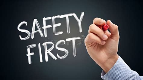 Safety First Concept With Hand Writing On Black Background Emphasizing The Importance Of
