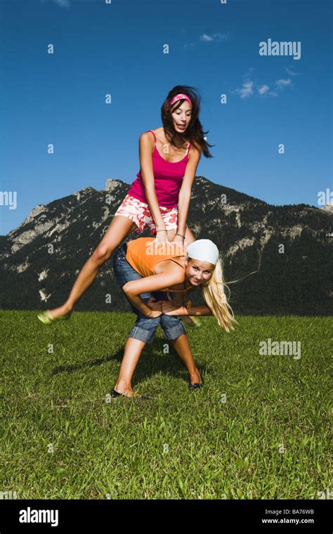 Teenagers Girls Two Meadow Leapfrog Cheerfully Series People 18 19 Years Friends Fun Joy Happily