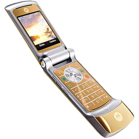 Celular Antiguo Con Detalles Dorados Y Cuerpo De Metal Telefonos