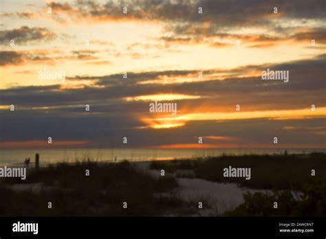 Blur Background Image Of A Beach Sunset On The Gulf Of Mexico Stock