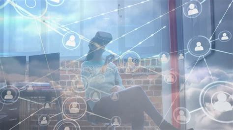 Female Developer Wearing Vr Headset Raising Finger And Initiating Data